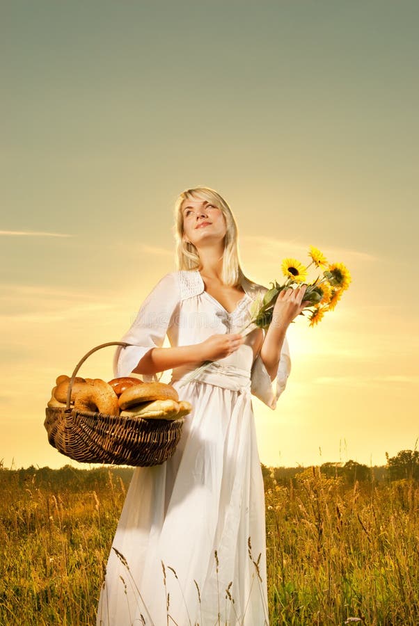 Woman with a baked bread stock image. Image of close, beauty - 6199689