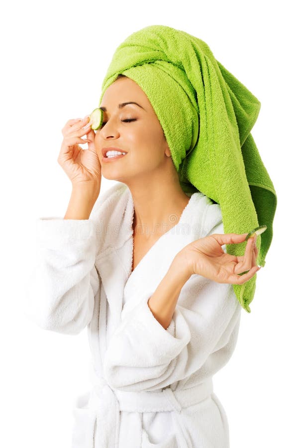 Woman in Bathrobe Applying Cucumber on Eyes Stock Image - Image of ...