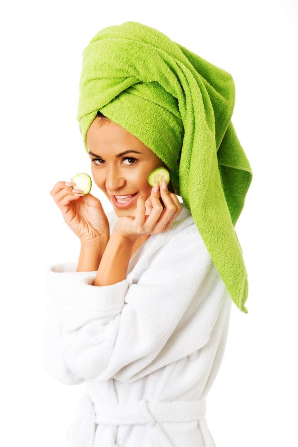 Woman in Bathrobe Applying Cucumber on Eyes Stock Photo - Image of ...