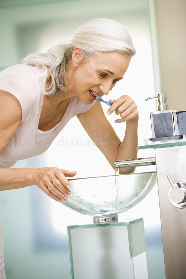 148 Beautiful Mature Woman Brushing Teeth Stock Photos - Free & Royalty ...
