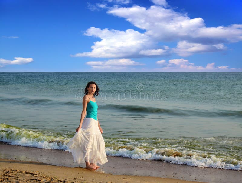 Woman on the Beach. stock photo. Image of beach, scenic - 26396218
