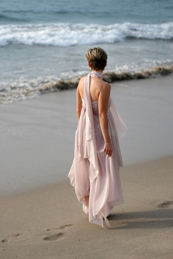 Woman on the beach editorial photography. Image of leisure - 536272