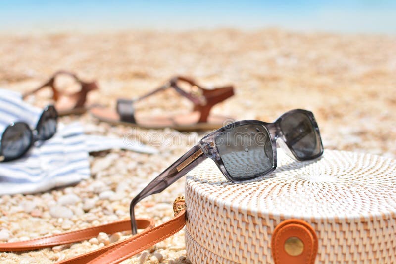 Woman Beach Accessories Lying on a Sand. Stock Photo - Image of satchel ...