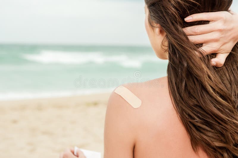 Woman at the Beach with a on Bandage Stock Image - Image of human ...
