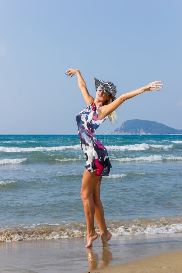 Woman on the beach stock image. Image of sand, beauty - 27835229