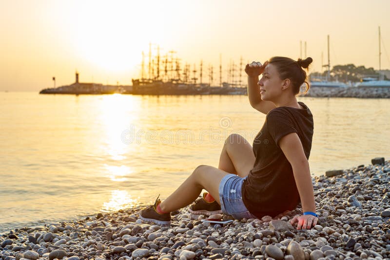 Woman on the Beach Looking into the Distance Stock Image - Image of ...