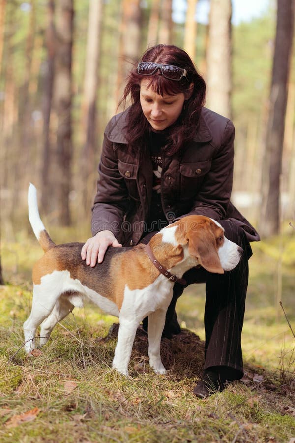 Woman with beagle stock image. Image of woman, animal - 13821975