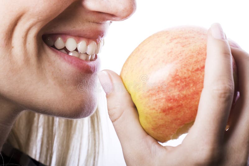 Woman with a Beautiful Smile Eating an Apple Stock Image - Image of ...