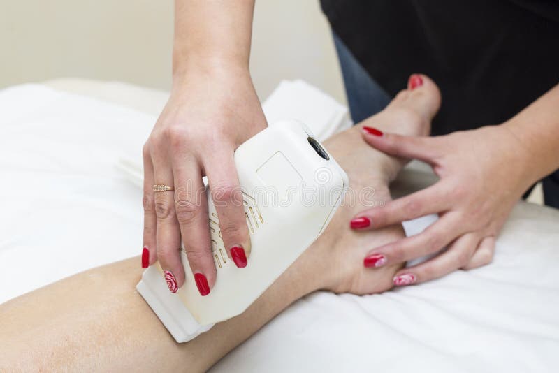 Woman in a beauty salon stock photo. Image of depilate - 67709256