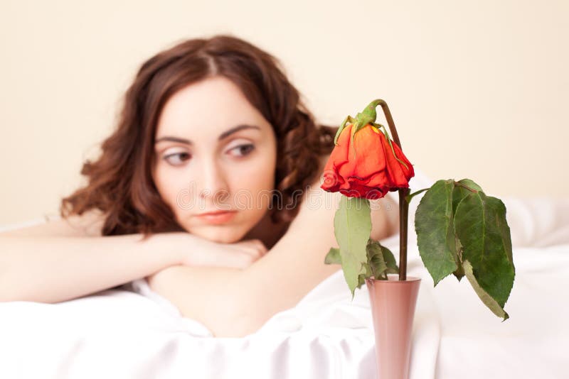 Woman in Bed Looking on the Rose (focus on Rose) Stock Photo - Image of ...