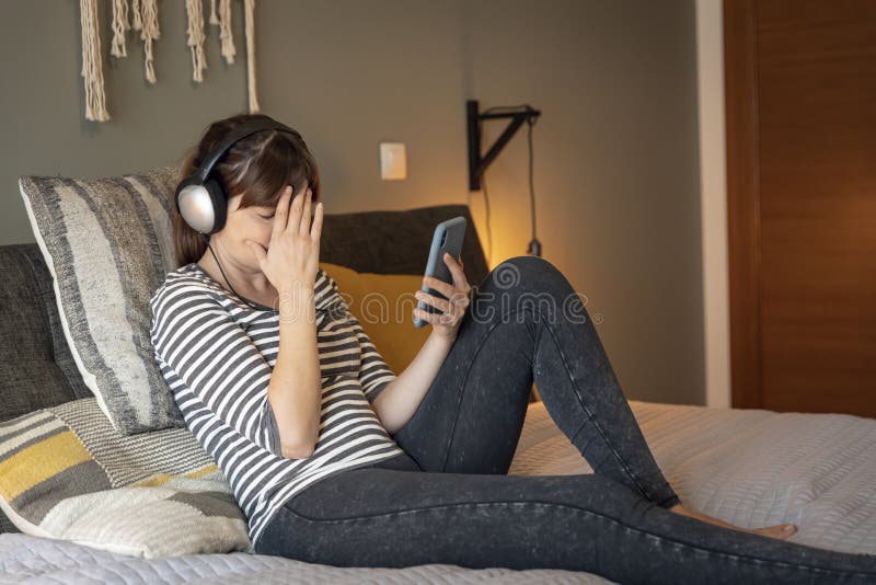 Sad woman at home stock image. Image of alone, depressed - 185559847