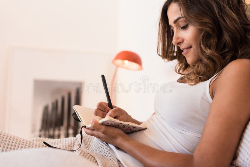Woman in the Bed Writting on Her Diary Stock Photo - Image of female ...