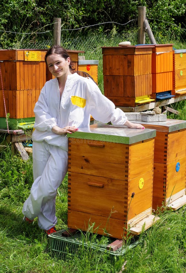Woman beekeeper with bees stock image. Image of clothing - 83821121