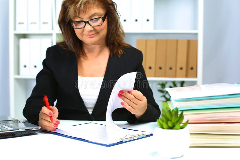 The Woman Behind the Desk in the Office Stock Image - Image of ...