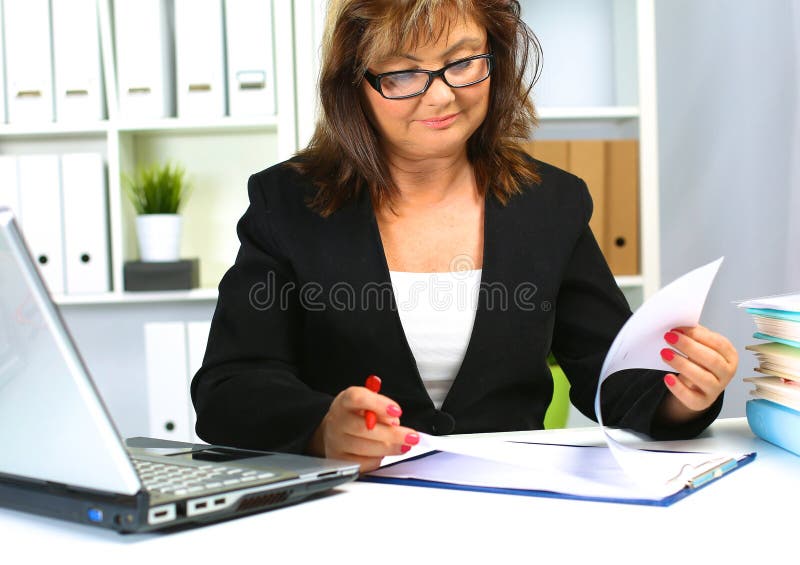 The Woman Behind the Desk in the Office Stock Photo - Image of ...