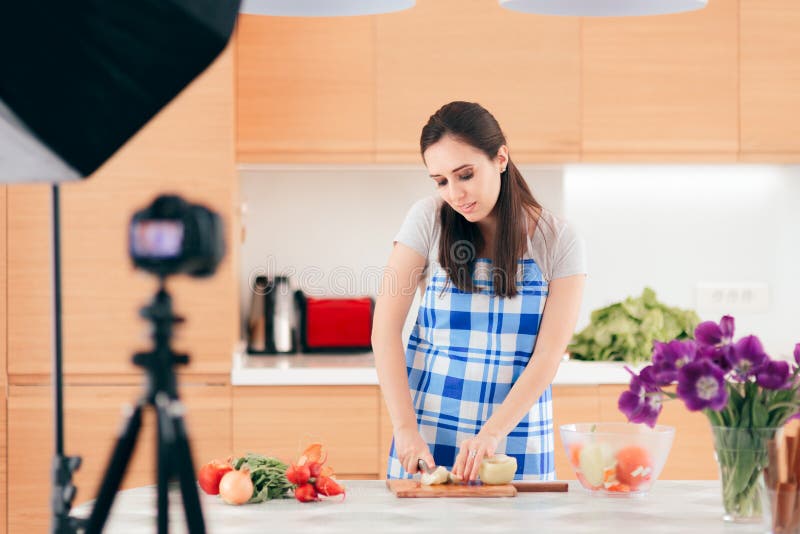 Female Food Vlogger Filming A Cooking Video In Her Kitchen Stock Image Image Of Explaining