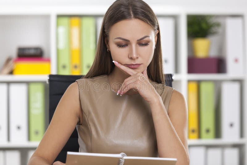 Woman in Beige Reading a Note Stock Image - Image of blond, modern ...