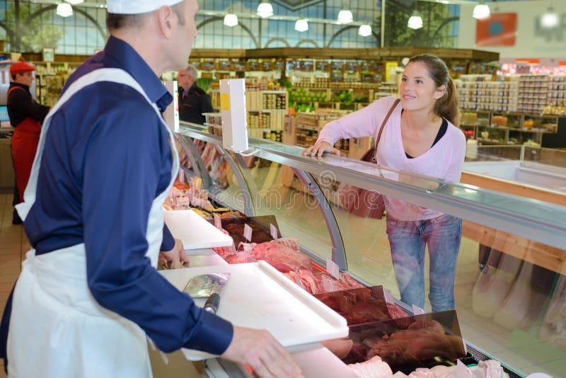 Woman Being Served by Butcher Stock Image - Image of protein ...