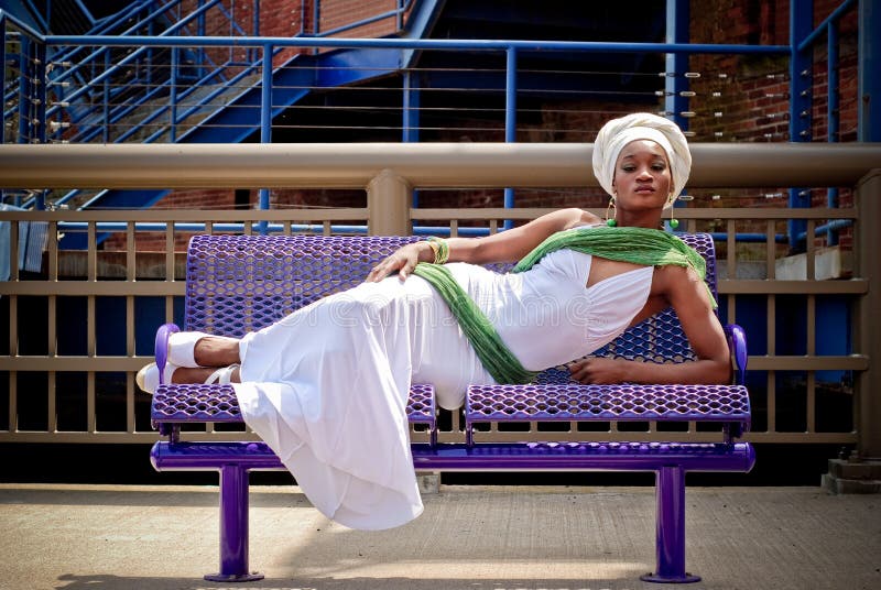 Woman on bench stock image. Image of bench, pretty, purple - 12463723