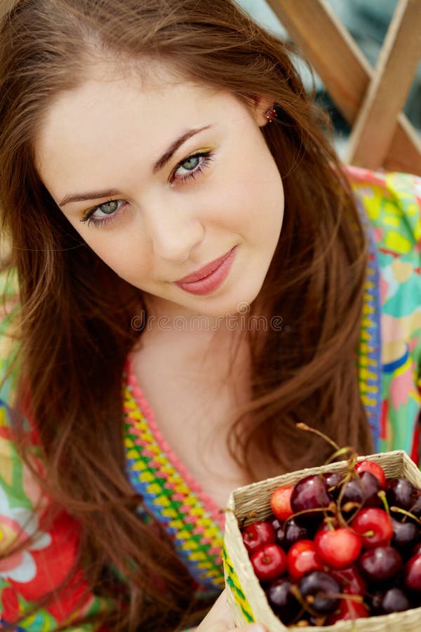 Woman with berries stock image. Image of face, cherry - 15104861