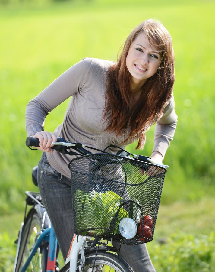 Muslim girl on bicycle stock photo. Image of adult, islam - 38359160
