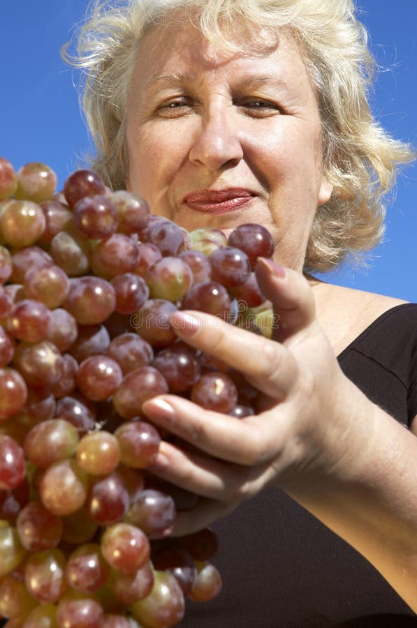 Woman with big grape stock image. Image of grapes, bunch - 272691