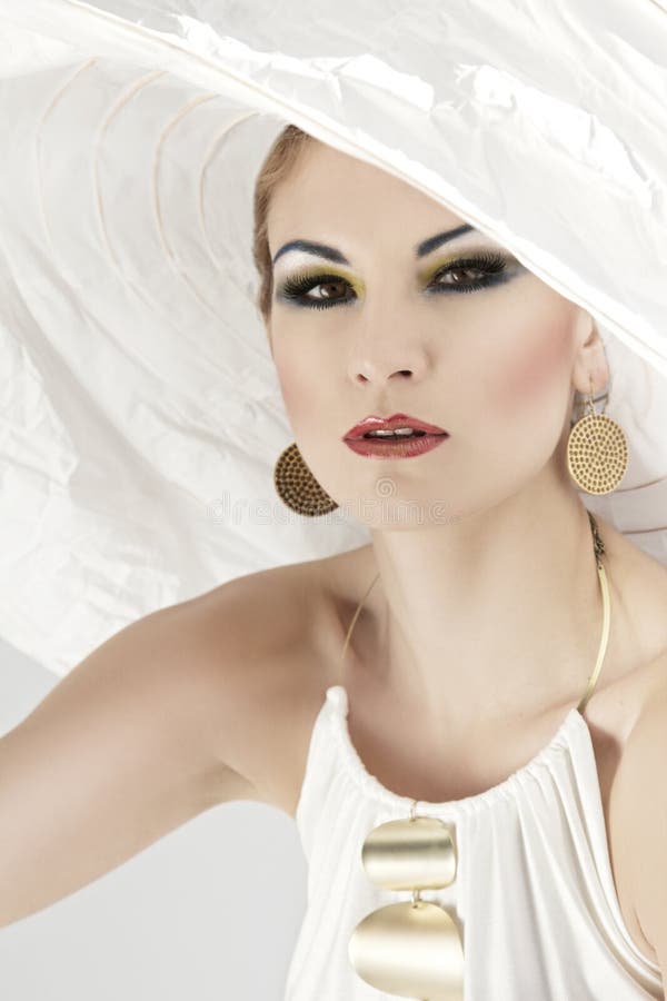 Woman in a big white hat stock image. Image of modern - 22080879