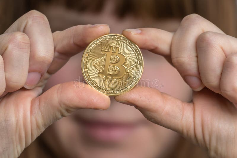 Woman with Bitcoin in Her Hand - Cryptocurrency Concept Stock Photo ...