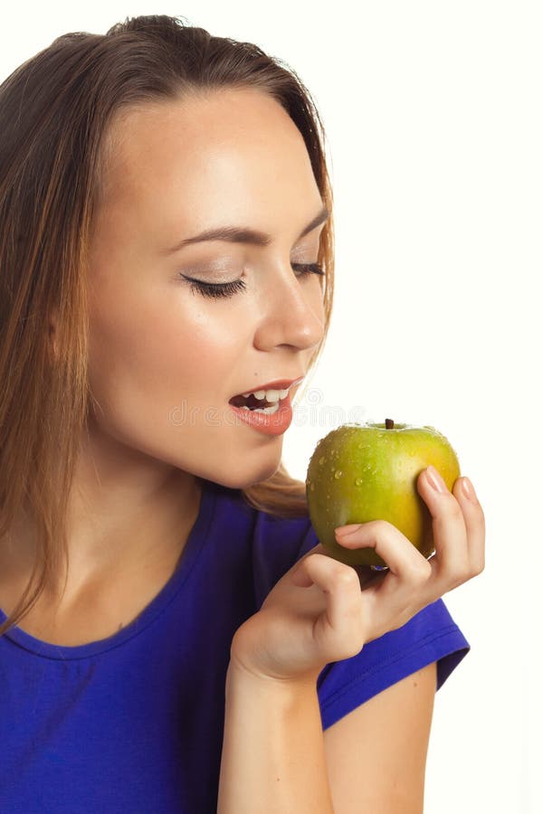 Woman biting green apple stock photo. Image of healthy - 46166084