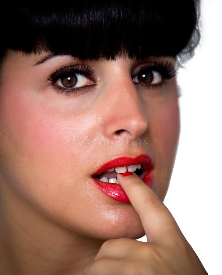 Woman biting her finger stock photo. Image of cute, adult - 32787202