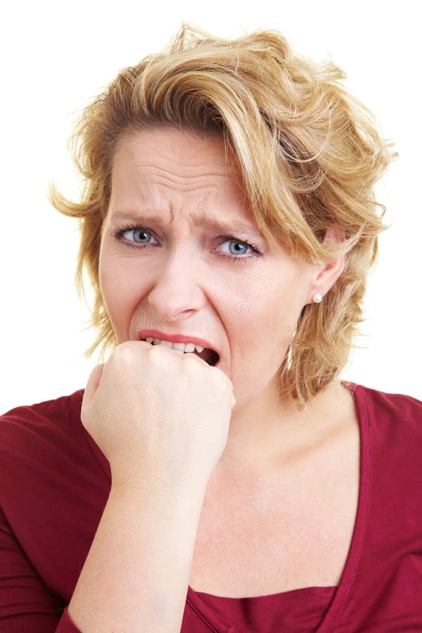 Woman biting her fist stock image. Image of head, anxiety - 12491903