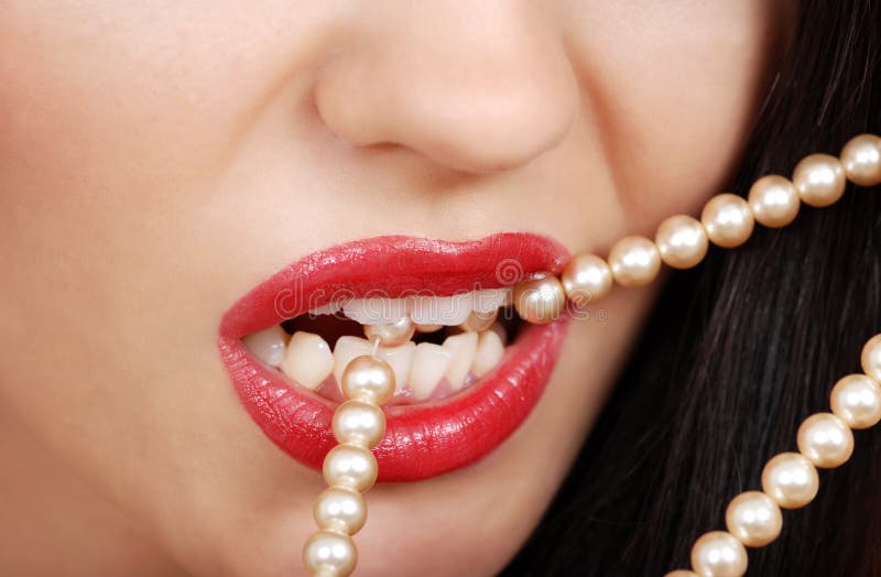 Woman Biting Pearl Necklace with Red Lipstick Stock Photo - Image of ...