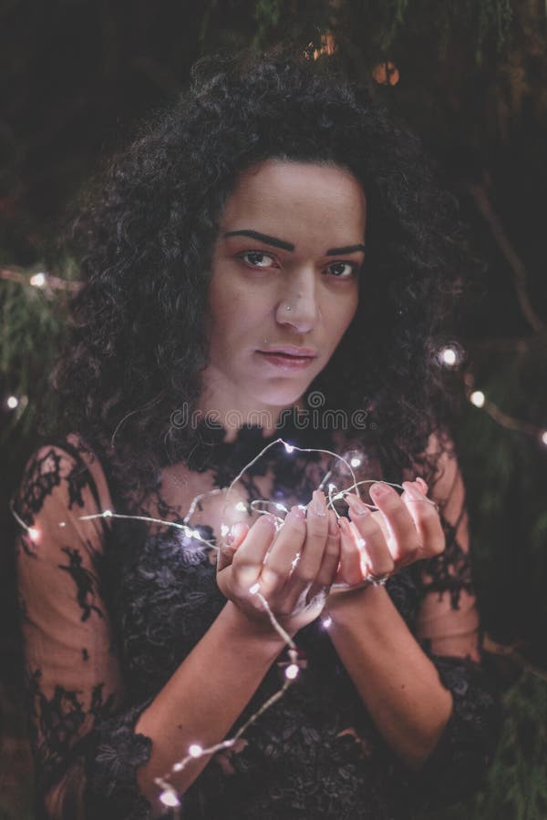 Woman in Black Lace Dress Holding String Lights Stock Photo - Image of ...