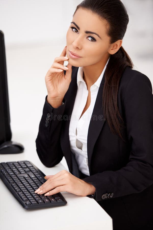 Woman in Black Suit Sitting in Front of Computer Stock Photo - Image of ...