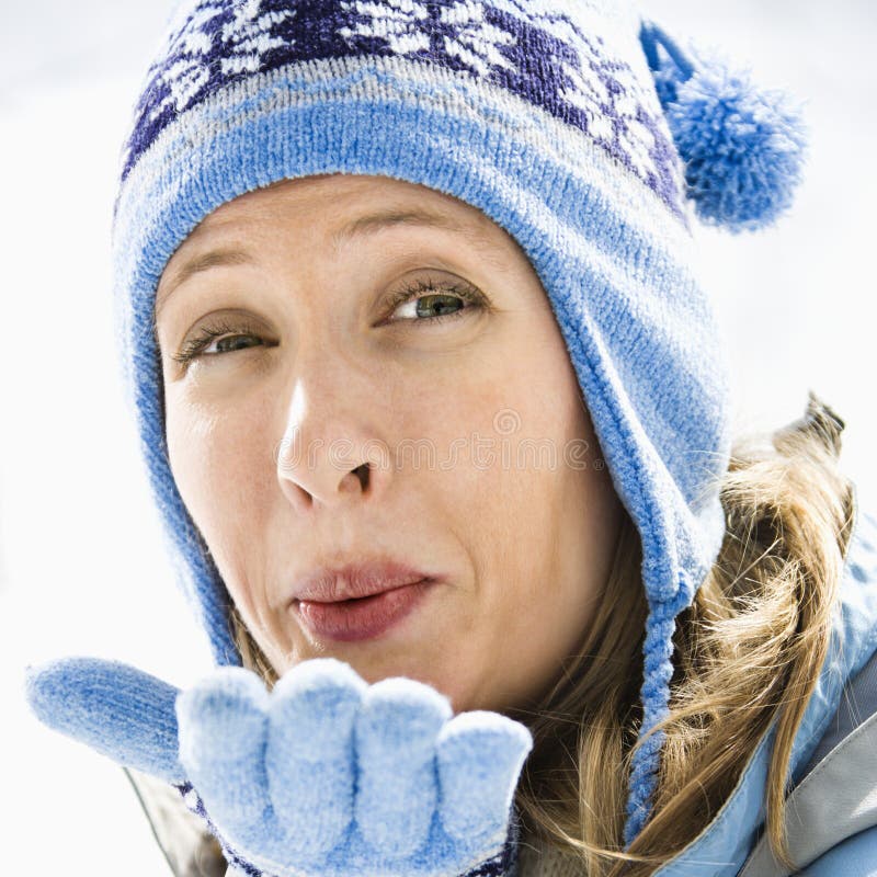 Woman blowing kiss. stock image. Image of blond, snow - 3184425