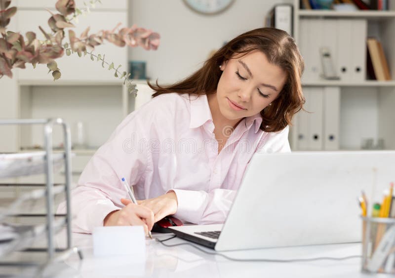 Woman Bookkeeper Writing on Paper in Office Stock Image - Image of ...