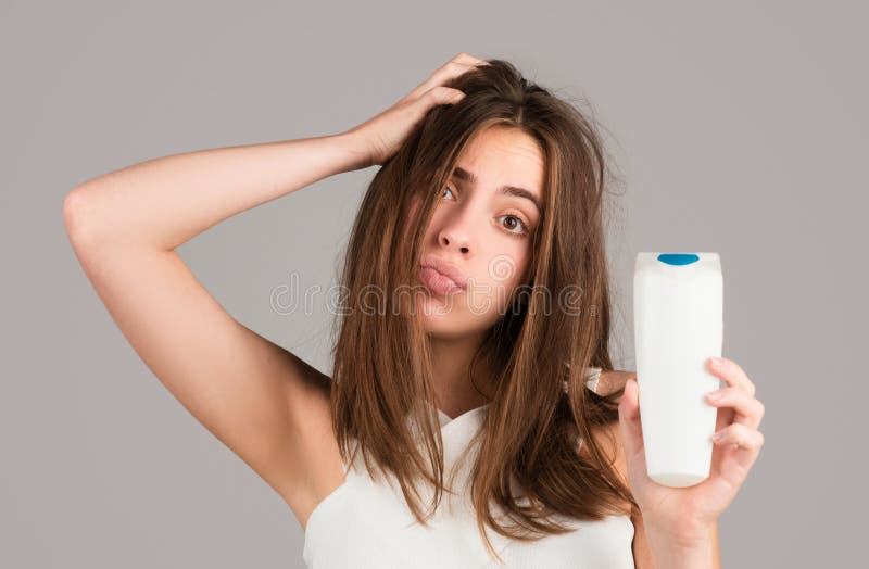 Woman with Bootle Shampoo Worried about Hair Loss. Hair Fall Problem ...
