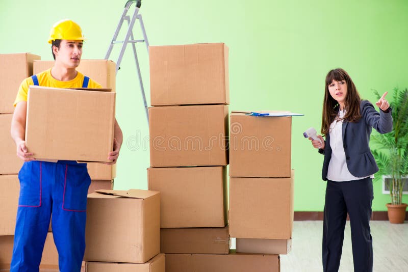 The Woman Boss and Man Contractor Working with Boxes Delivery Stock ...