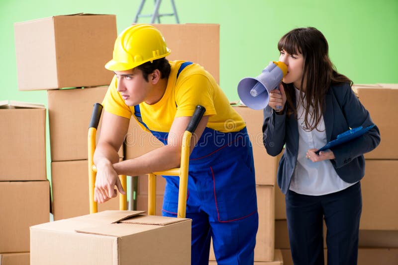 The Woman Boss and Man Contractor Working with Boxes Delivery Stock ...
