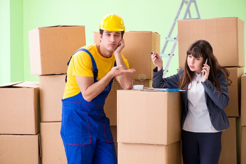 The Woman Boss and Man Contractor Working with Boxes Delivery Stock ...
