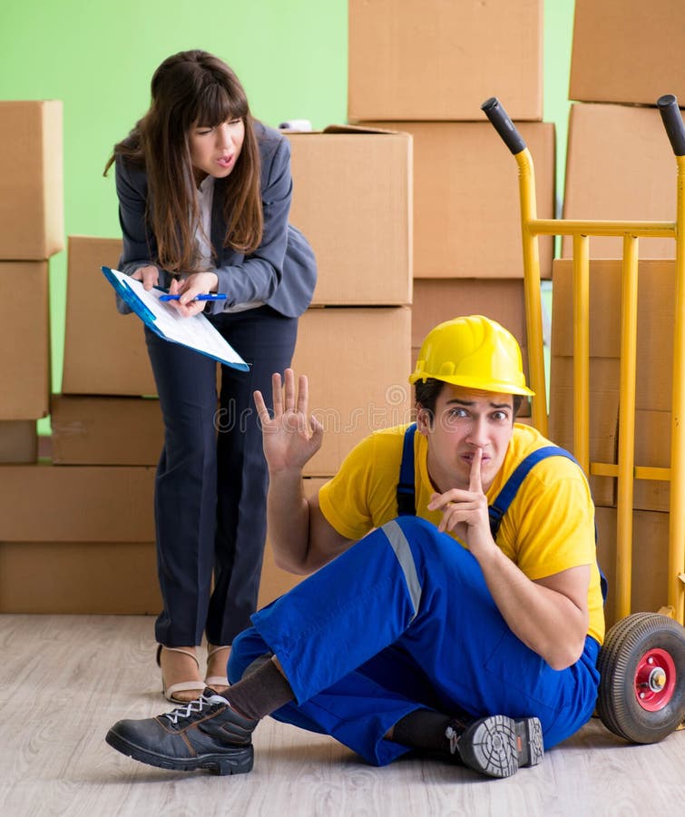 Woman Boss and Man Contractor Working with Boxes Delivery Stock Photo ...