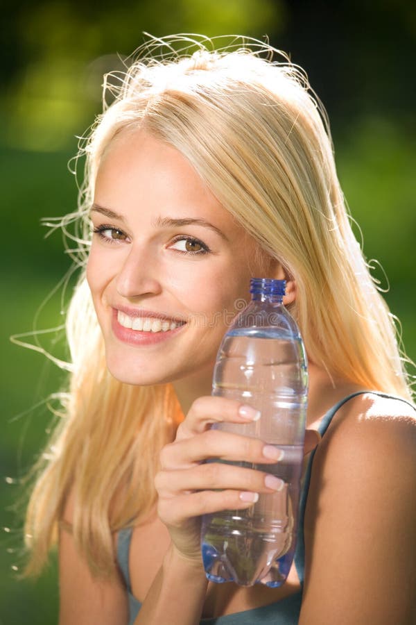 Woman with water stock image. Image of outside, female - 14909799