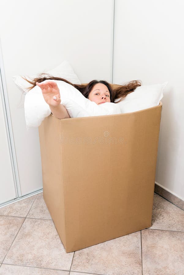 Woman in a box stock image. Image of home, cardboard - 77703925