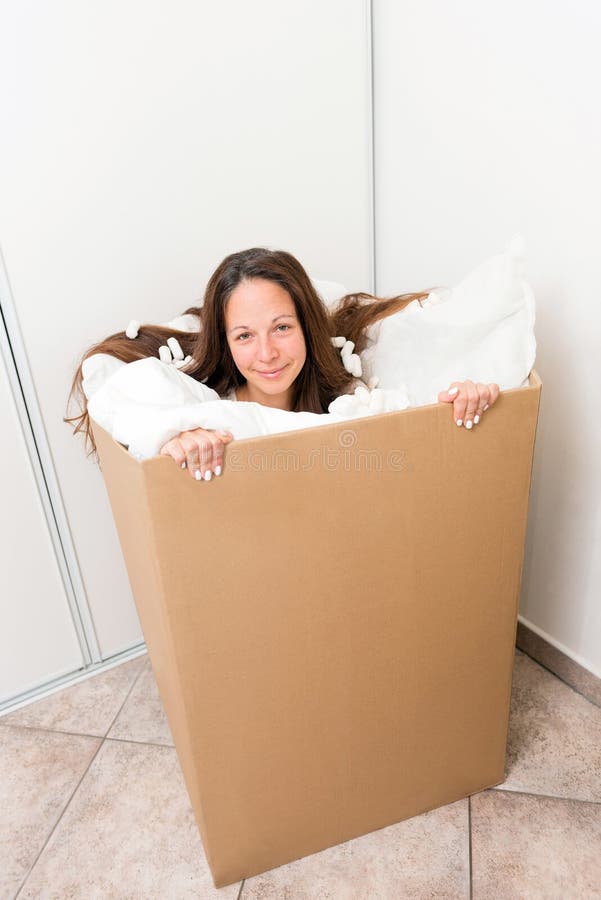 Woman in a box stock image. Image of container, home - 77704767