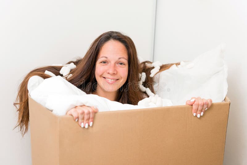 Woman in a box stock photo. Image of adult, courier, inside - 77705102