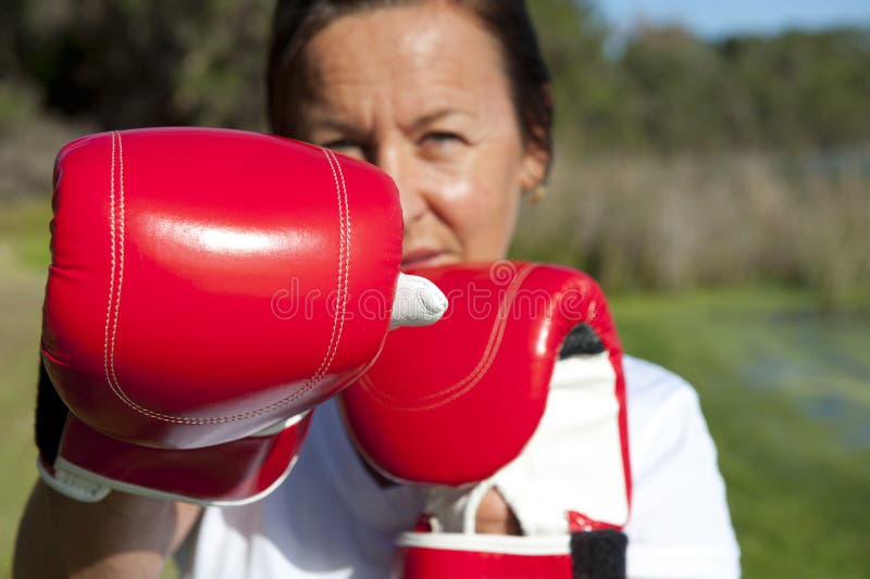 Woman with Boxing Gloves stock image. Image of defending - 21906639