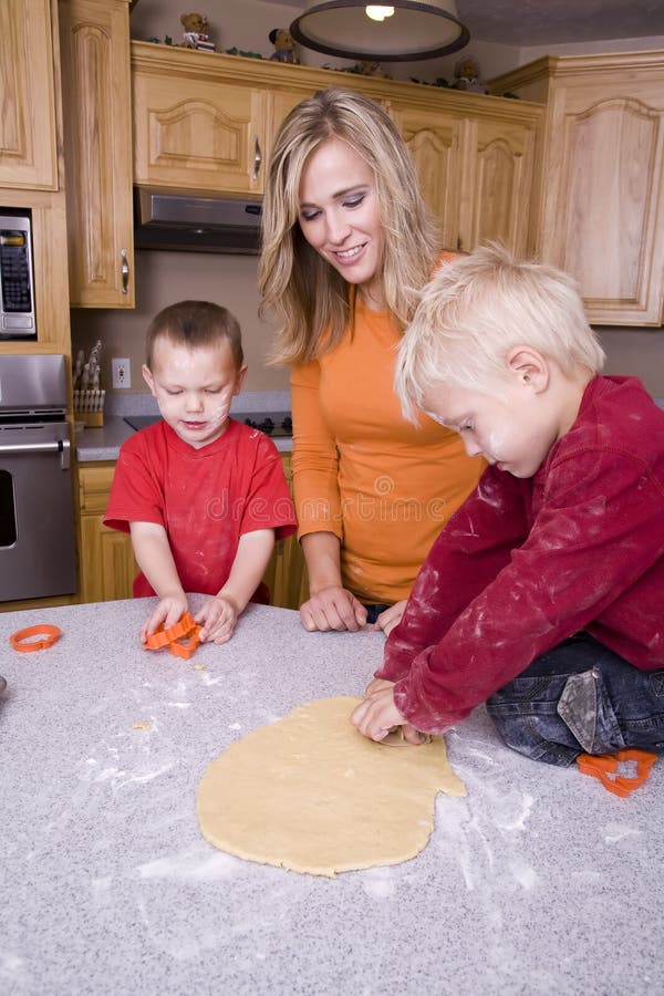 Woman and Boys Making Cookies Stock Image - Image of food, bake: 11482445