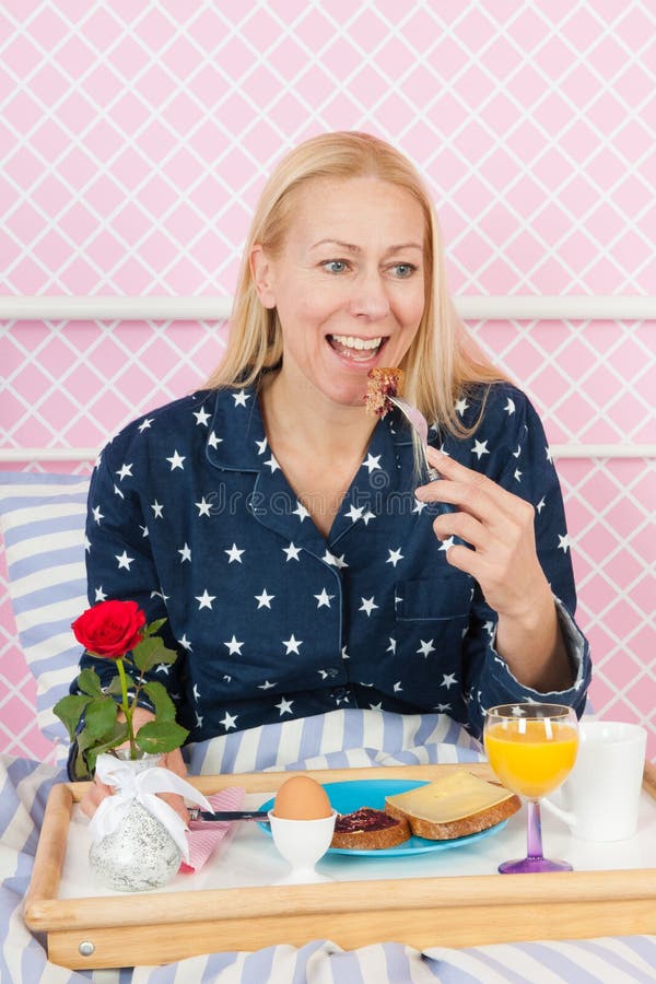 Woman breakfast on bed stock image. Image of mothersday - 57146703