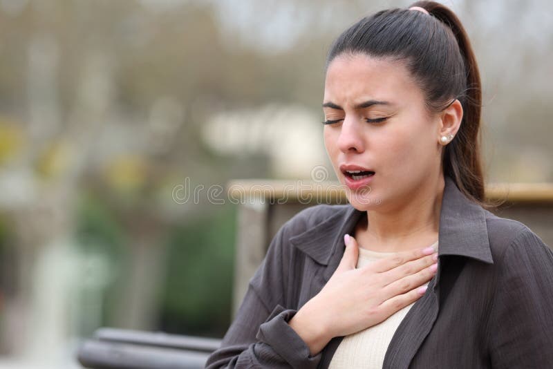 Woman with Breathing Problems in a Park Stock Photo - Image of health ...