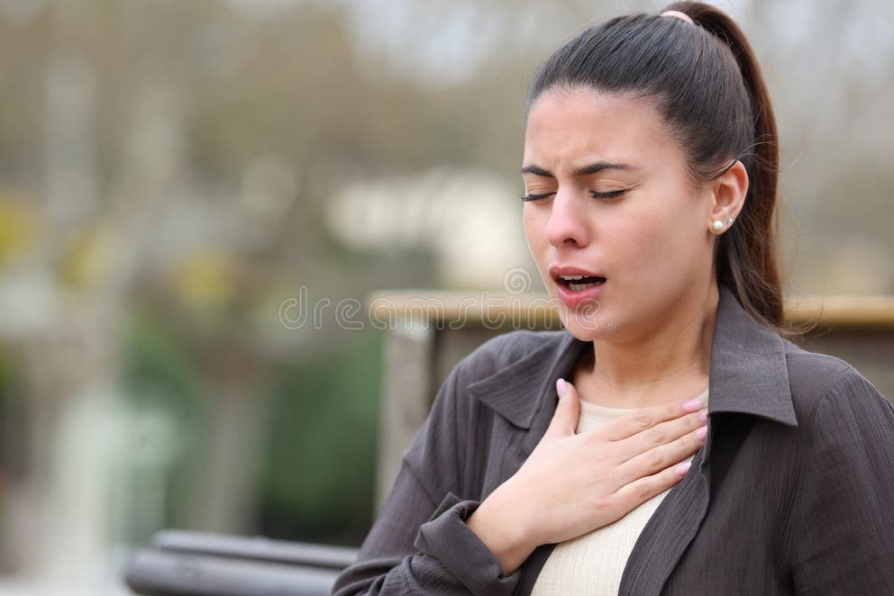 Woman with Breathing Problems in a Park Stock Photo - Image of health, problem: 264869220